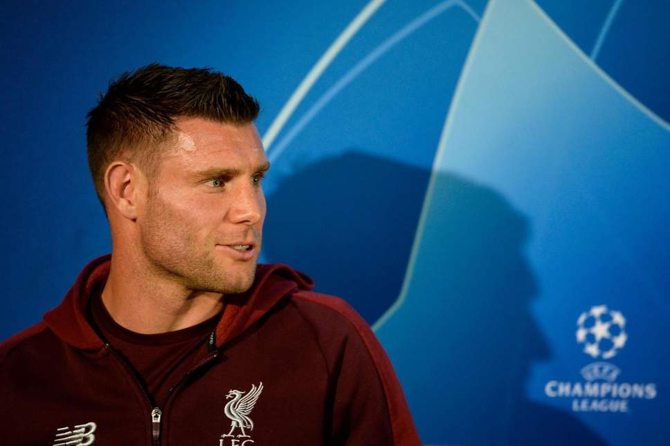 Liverpool's Milner cheering on Manchester United