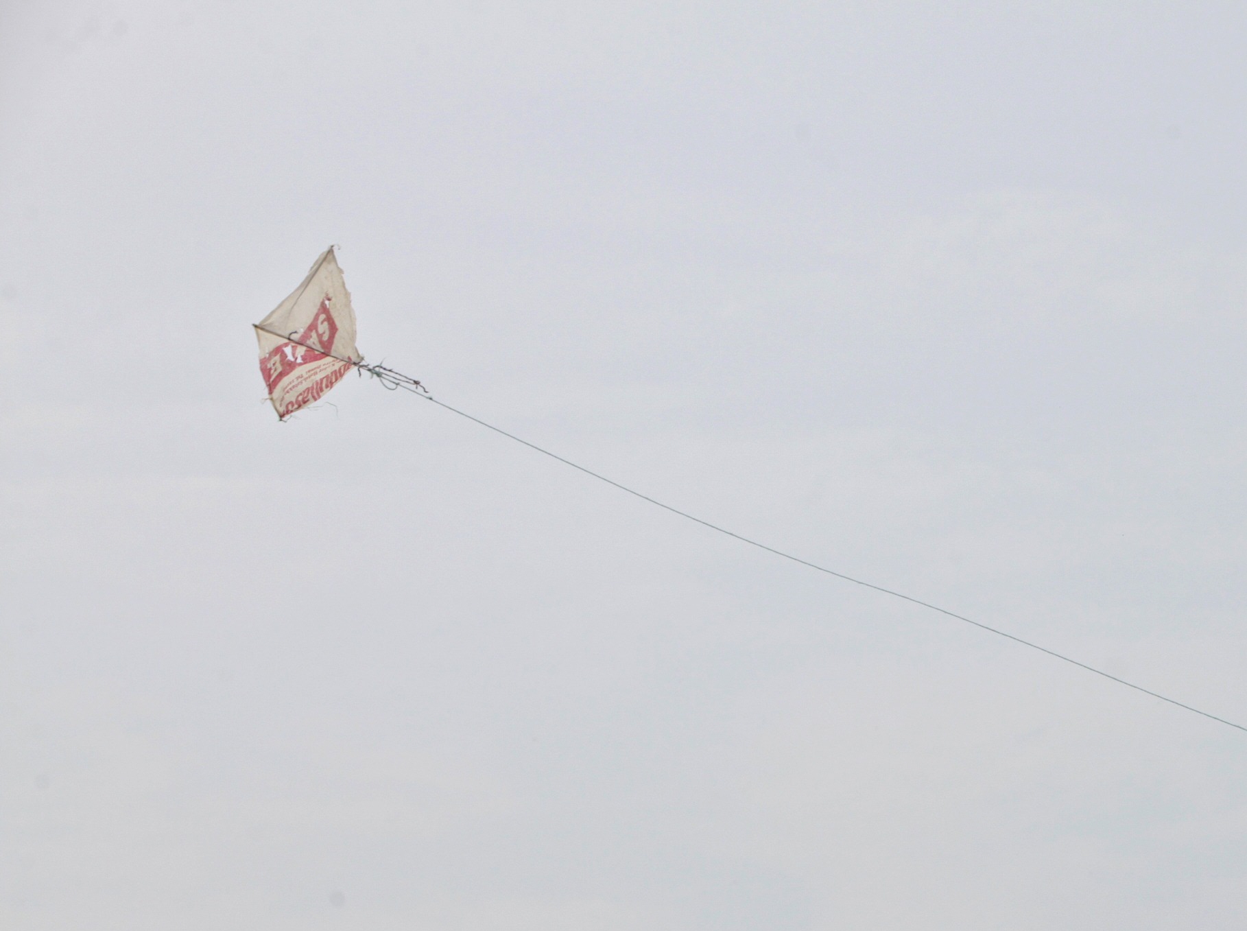 Kite string slits throat of sole bread-earner of family