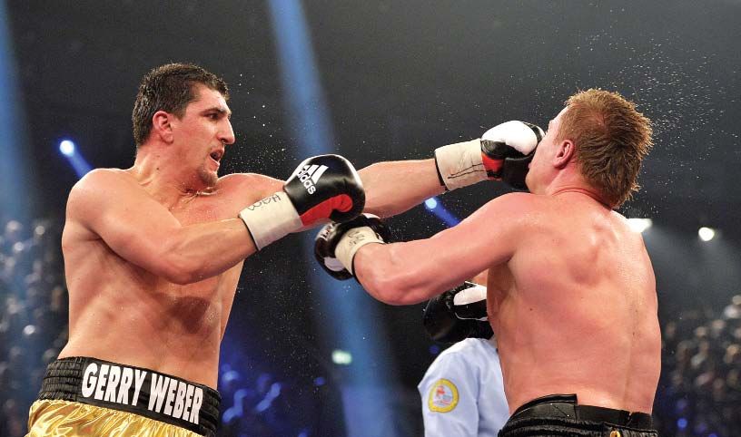 Boxing: Povetkin retains heavyweight title